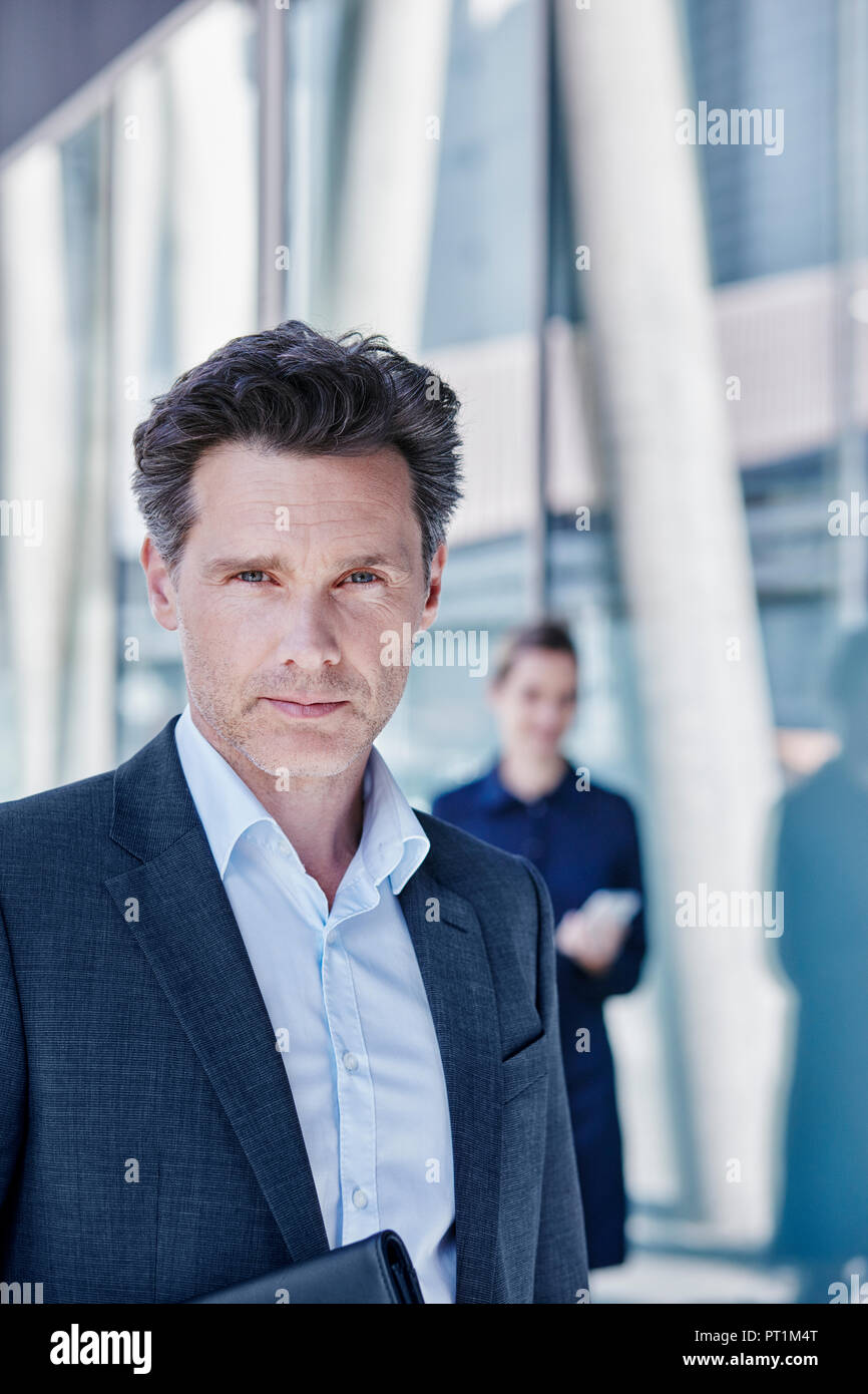 Portrait of serious businessman Stock Photo - Alamy