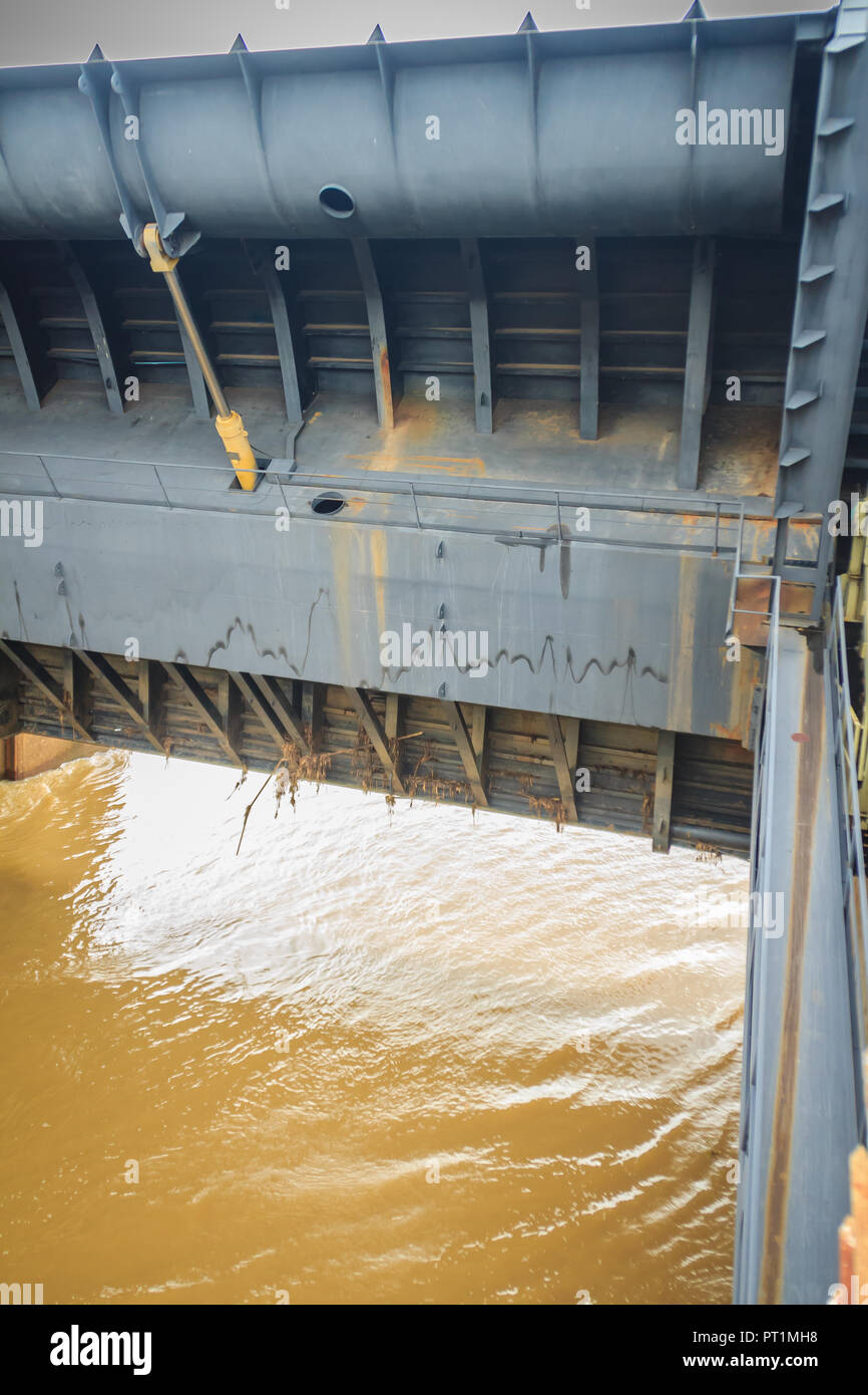 Hydraulic water gate is shifting up to allow water flow through in the ...