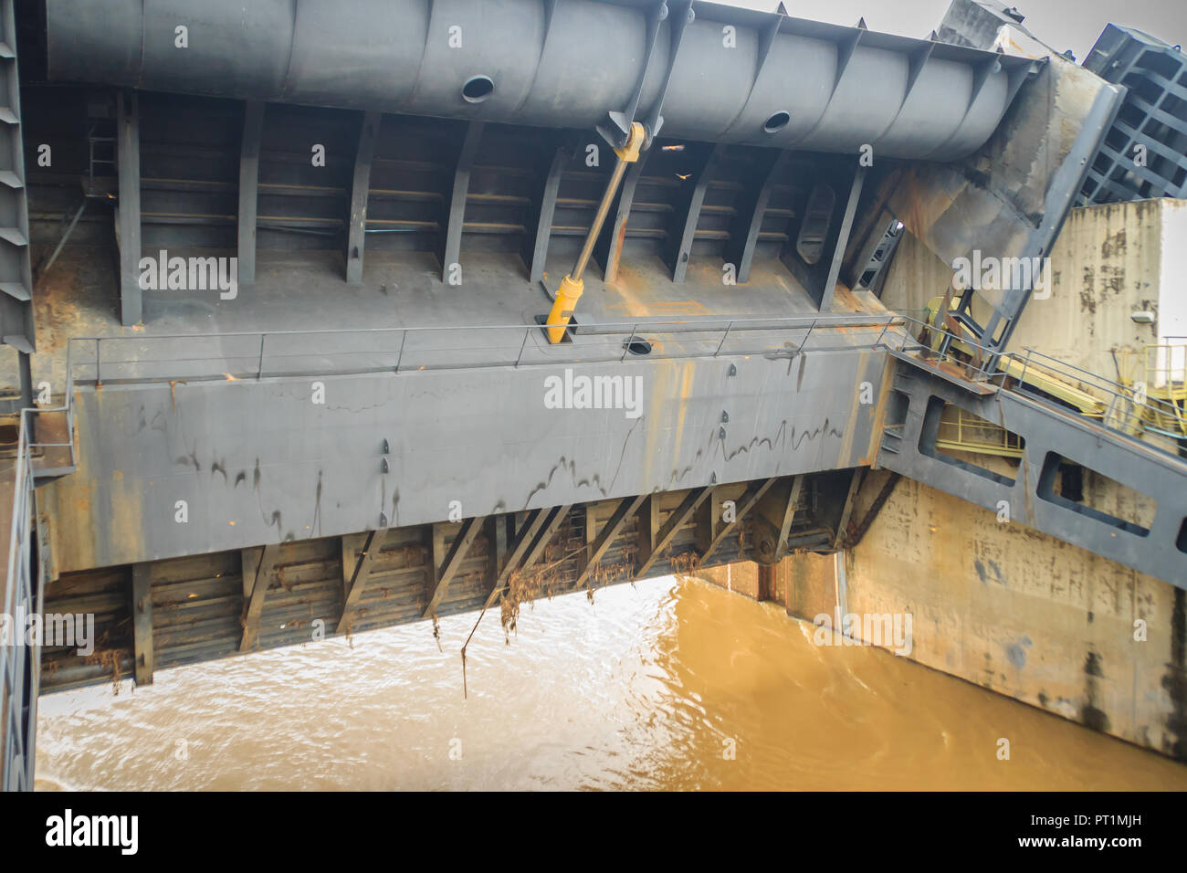 Hydraulic water gate is shifting up to allow water flow through in the ...