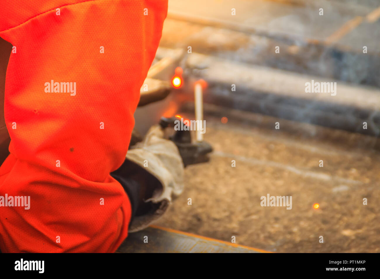 Abstract blurred focus with bokeh of steel welding with sparks. Blurry ...