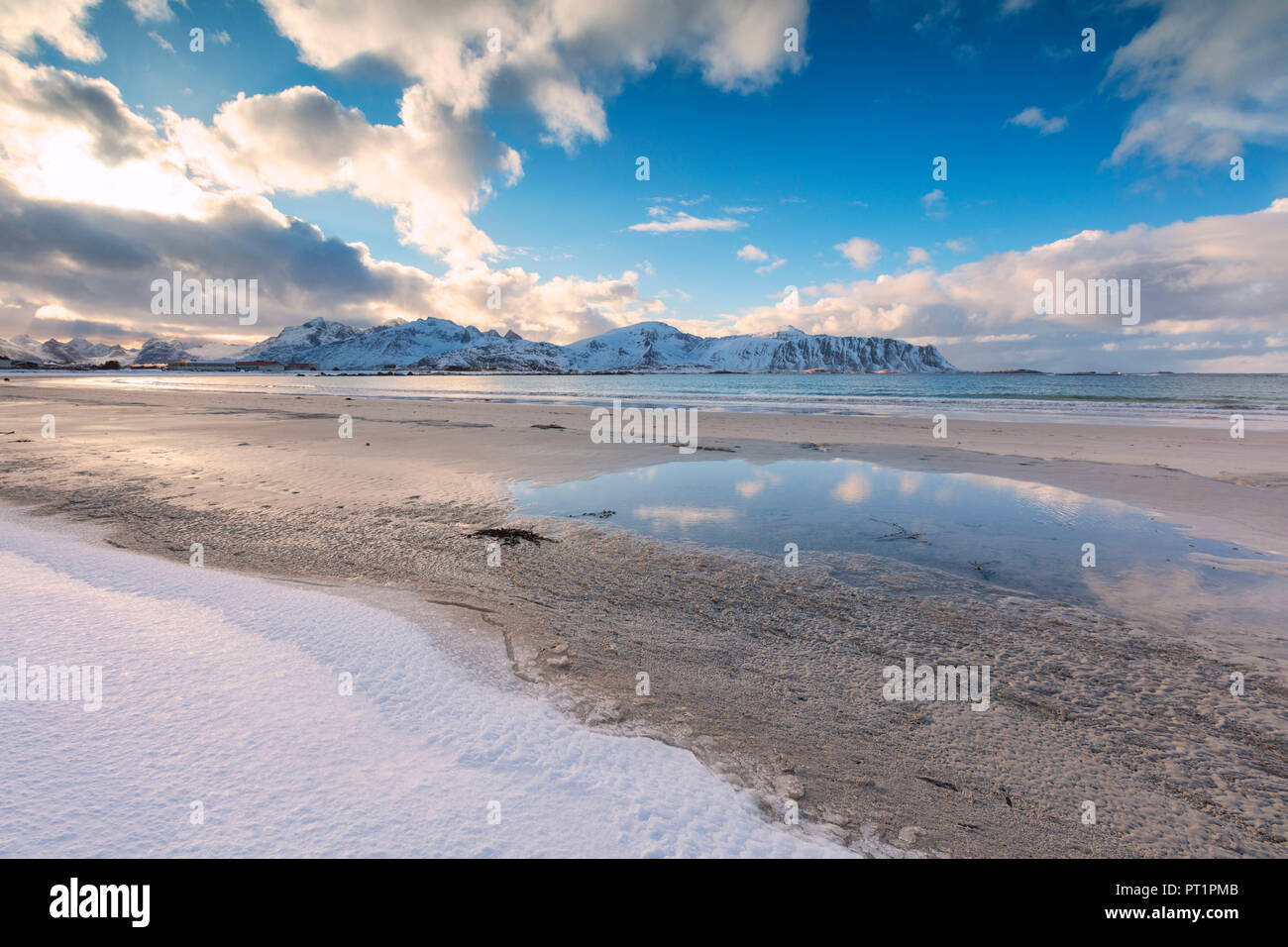 Snow on sandy beach, Ramberg, Flakstad municipality, Lofoten Islands ...