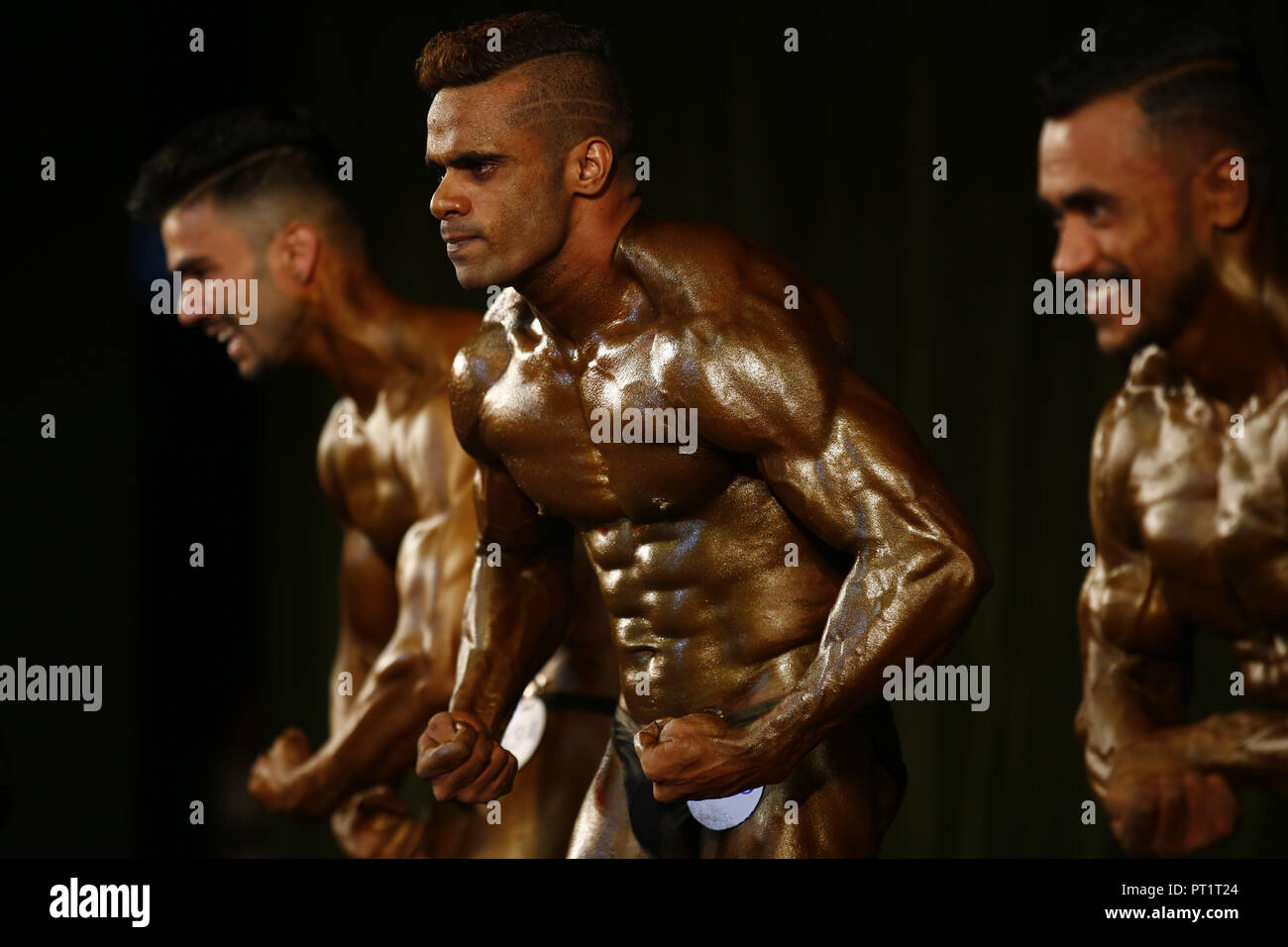 Kathmandu, Nepal. 5th Oct, 2018. Nepalese bodybuilders flex during the ...