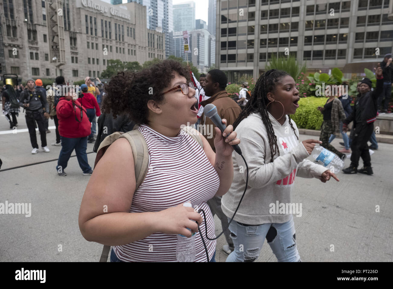 Chicago, Illinois, USA. 5th Oct, 2018. Protestor march through downtown ...