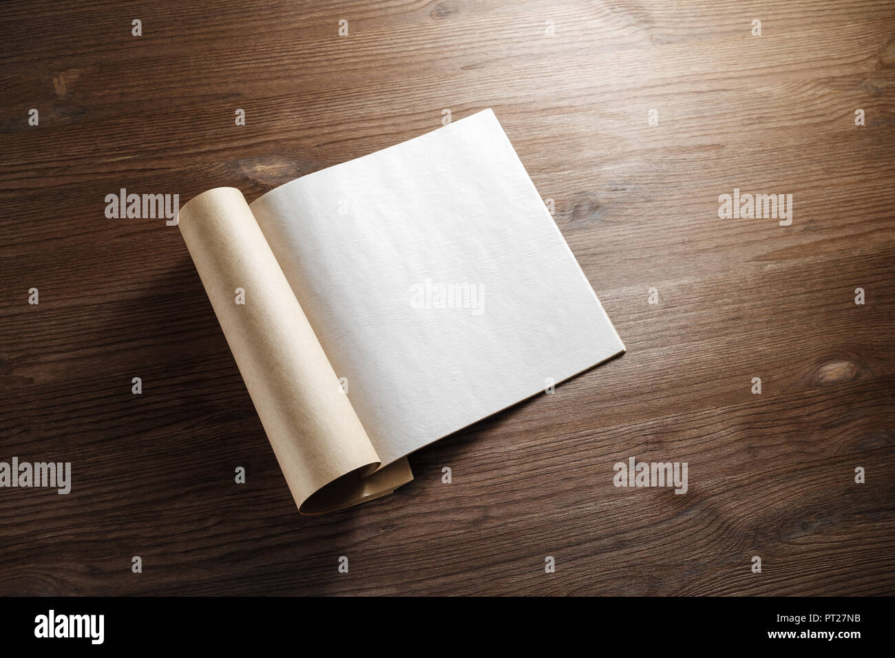 Blank magazine pages on wood table background. Responsive design ...