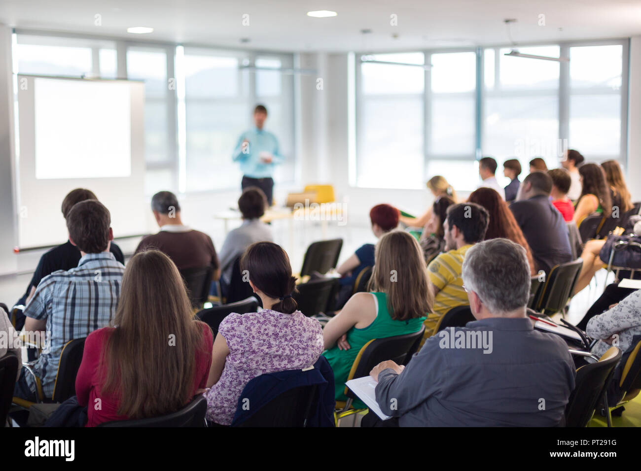 Speaker giving presentation talk at business conference Stock Photo - Alamy