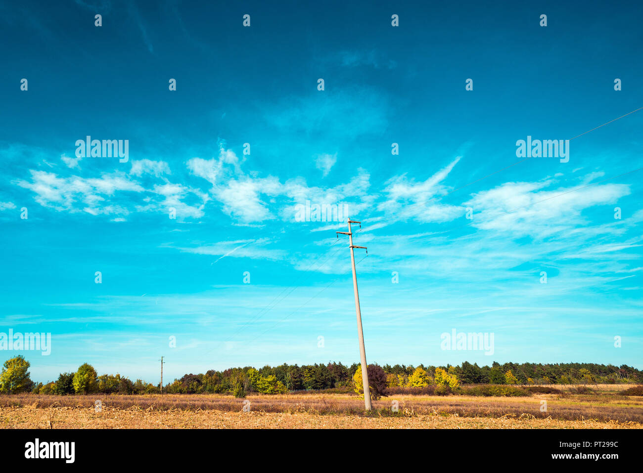 Countryside landscape with electrical post horizontal Stock Photo - Alamy