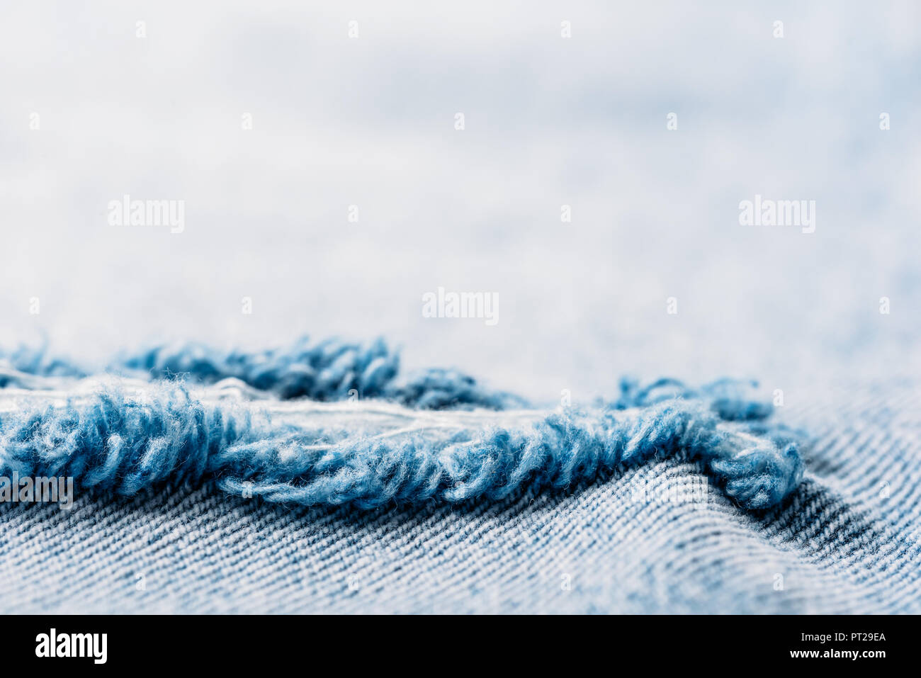 Ripped denim texture hi-res stock photography and images - Alamy