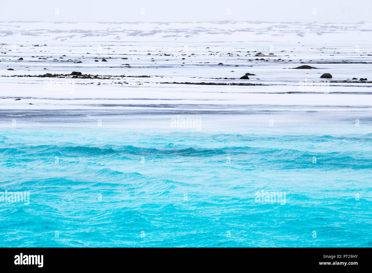Winter Iclend landscape, with frozen hills and clear river Stock Photo ...