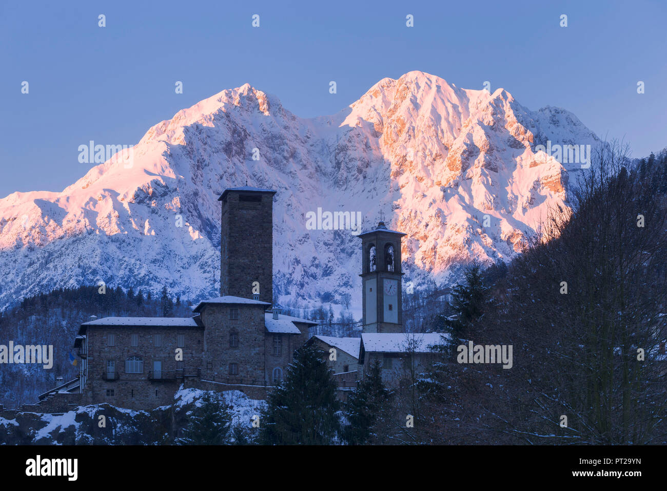 Village of Gromo with Pizzo Arera in the background at sunrise, Gromo ...