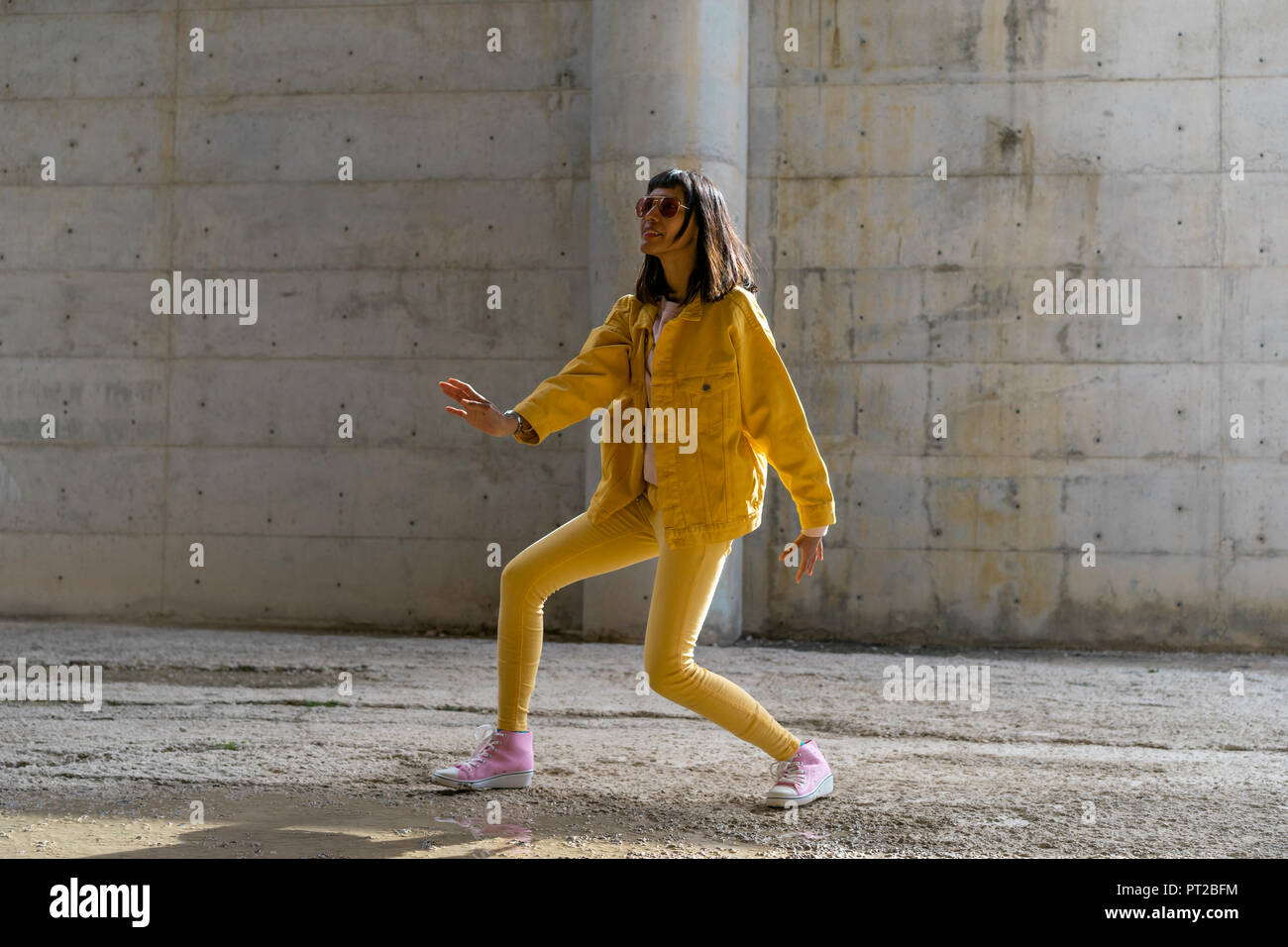 Woman wearing denim coat hi-res stock photography and images - Alamy