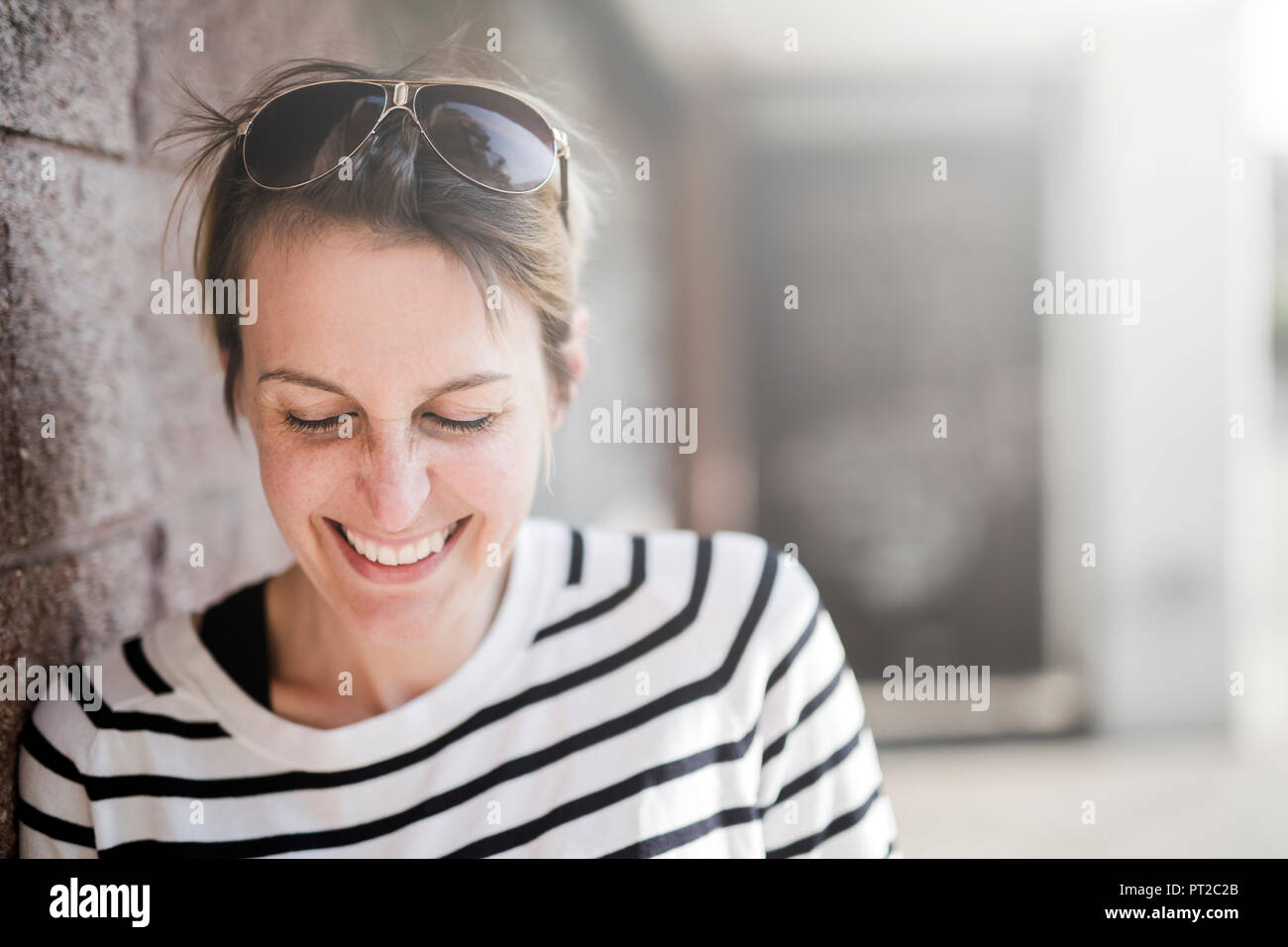 Happy laughing short hair blond hi-res stock photography and images - Alamy
