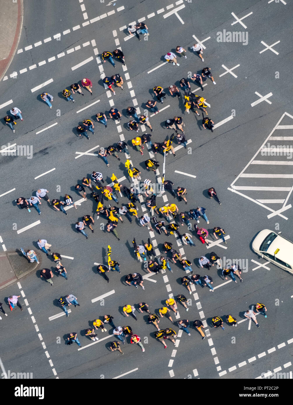Bvb fans on their way to the stadium hi-res stock photography and ...