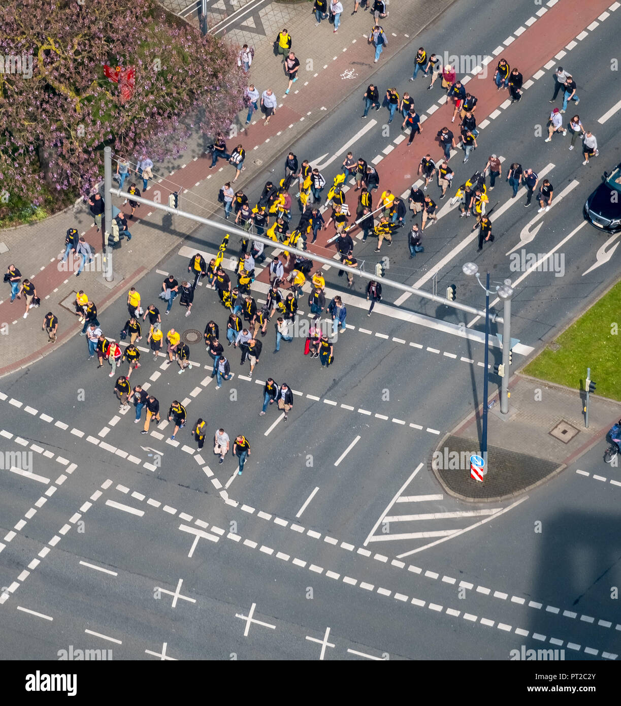 Bvb fans on their way to the stadium hi-res stock photography and ...