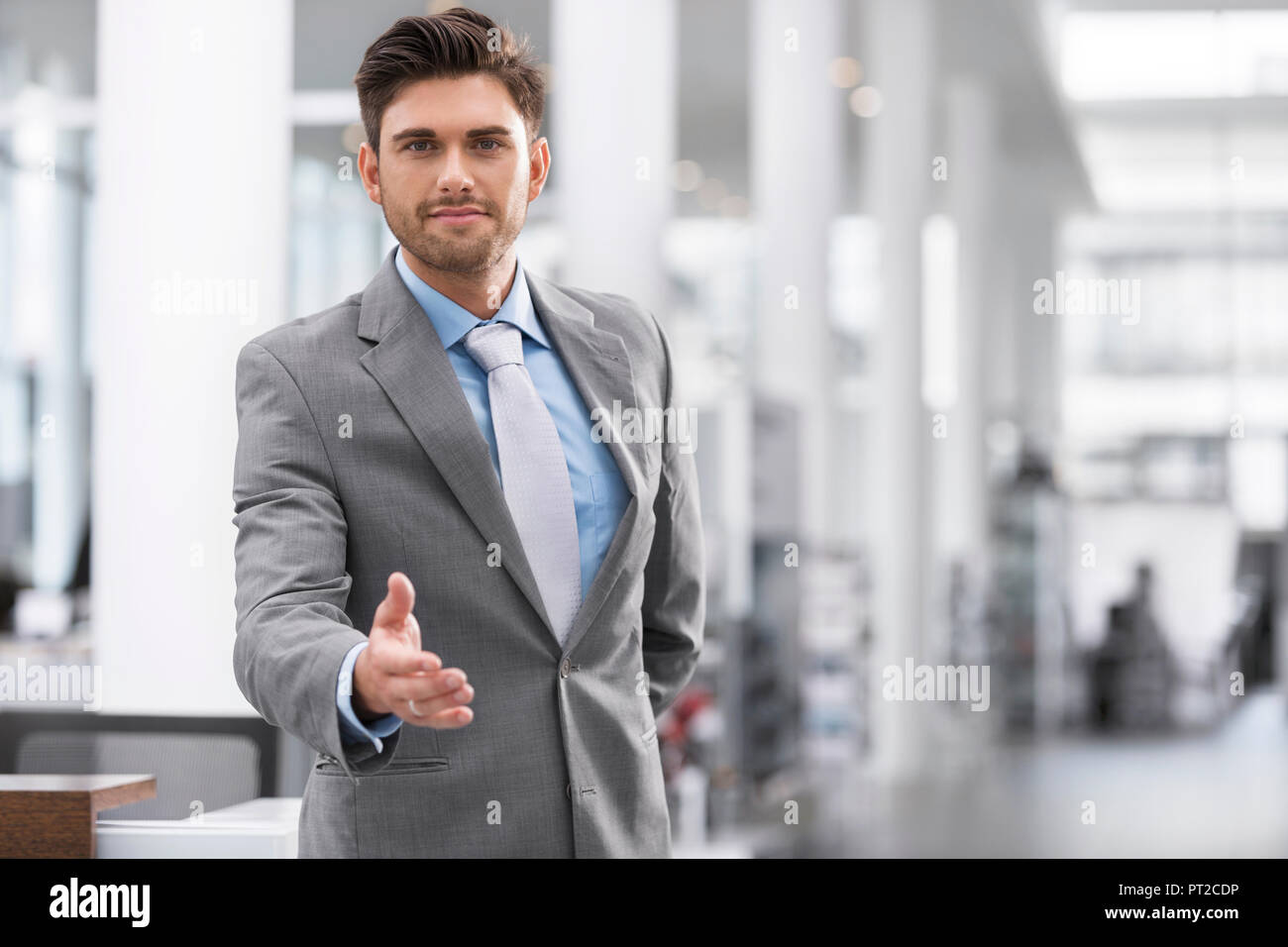 Businessman reaching out hand handshake hi-res stock photography and ... Businessman reaching out hand handshake hi-res stock photography and ...