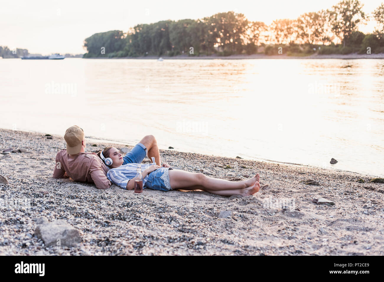 Man relaxing enjoying sunset hi-res stock photography and images - Alamy