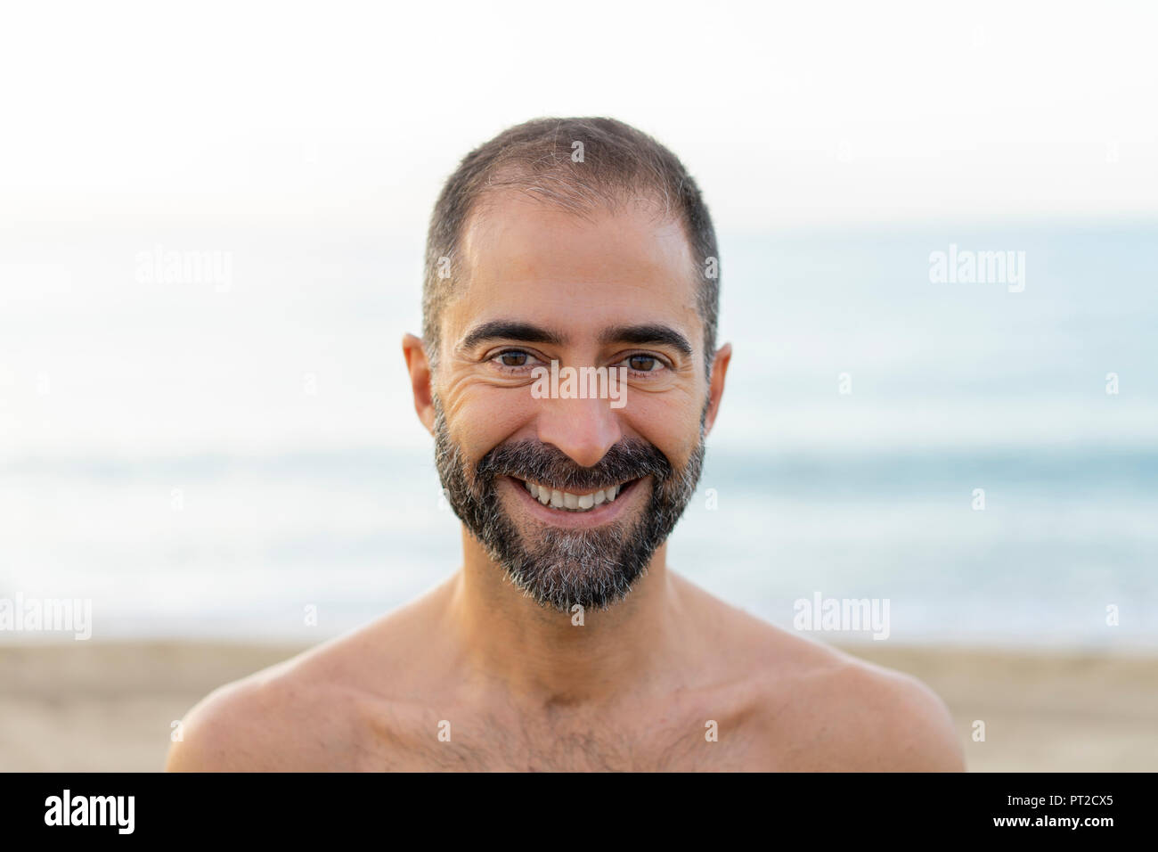 Happy man beach hi-res stock photography and images - Alamy
