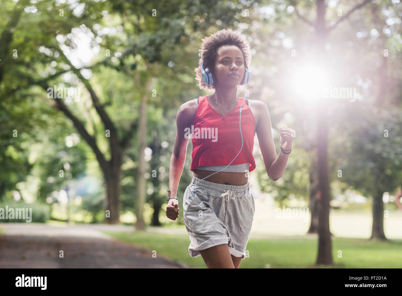 Run with headphones hi-res stock photography and images - Alamy