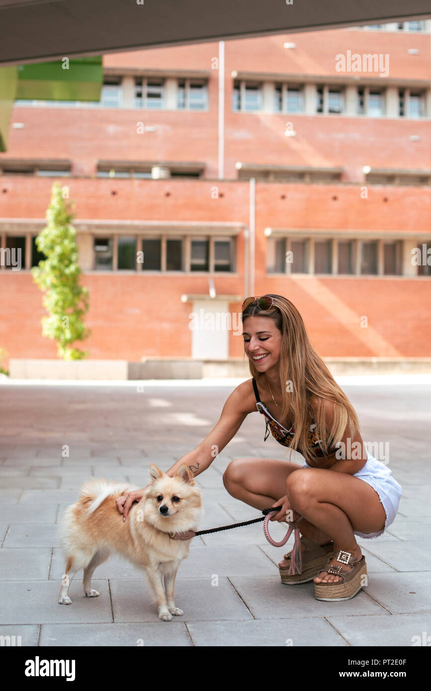 Dog walk owner young hi-res stock photography and images - Alamy