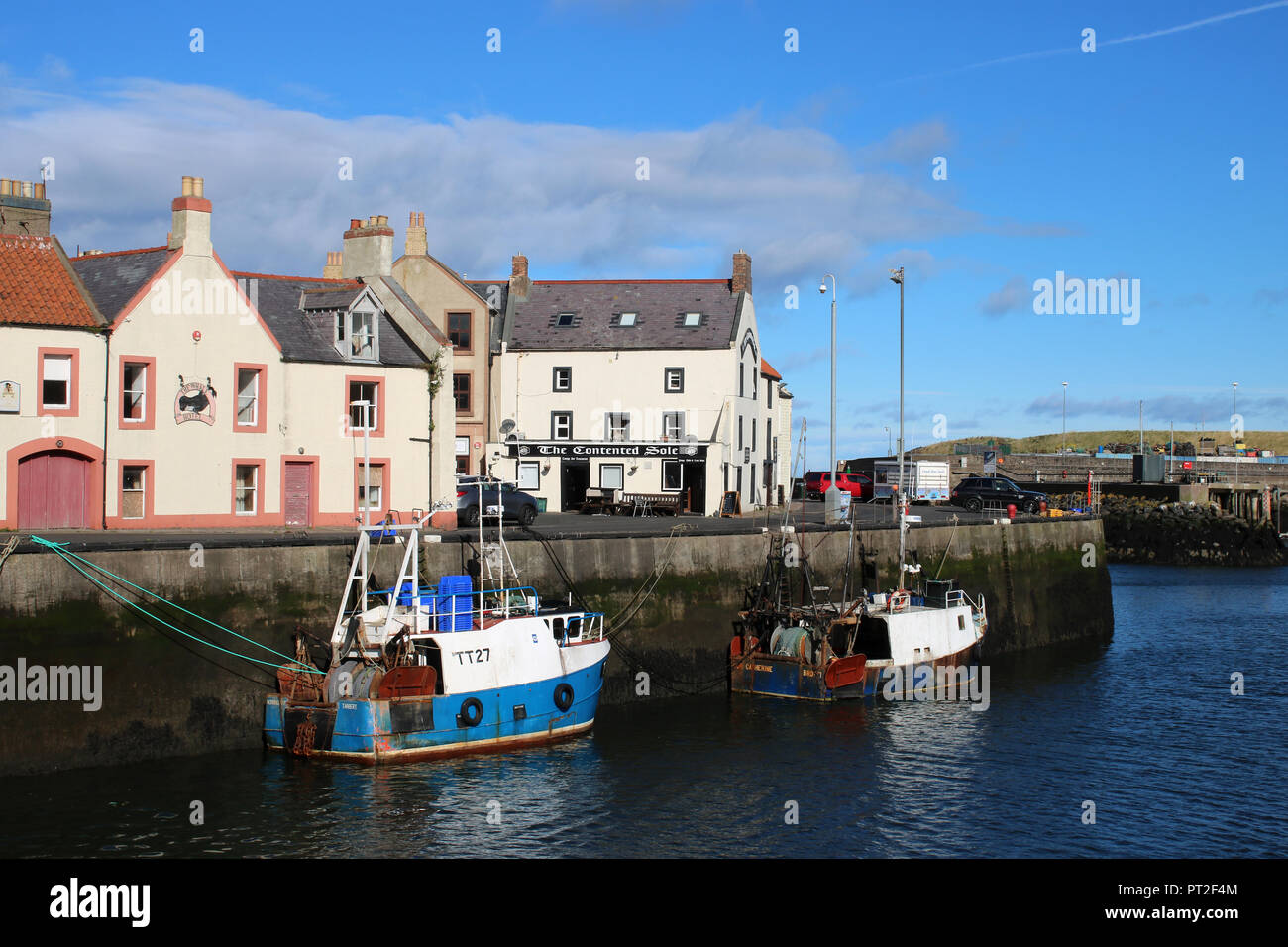 View of fishing boats in Eyemouth Harbor, Borders Region, Scotland with ...
