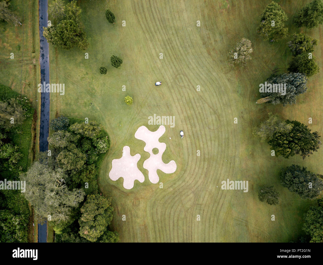 Indonesia, Bali, Aerial view of golf course with bunker and green Stock ...