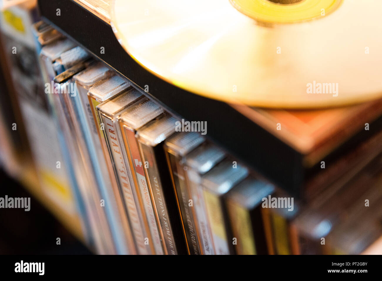 CD cases on the shelf Stock Photo - Alamy