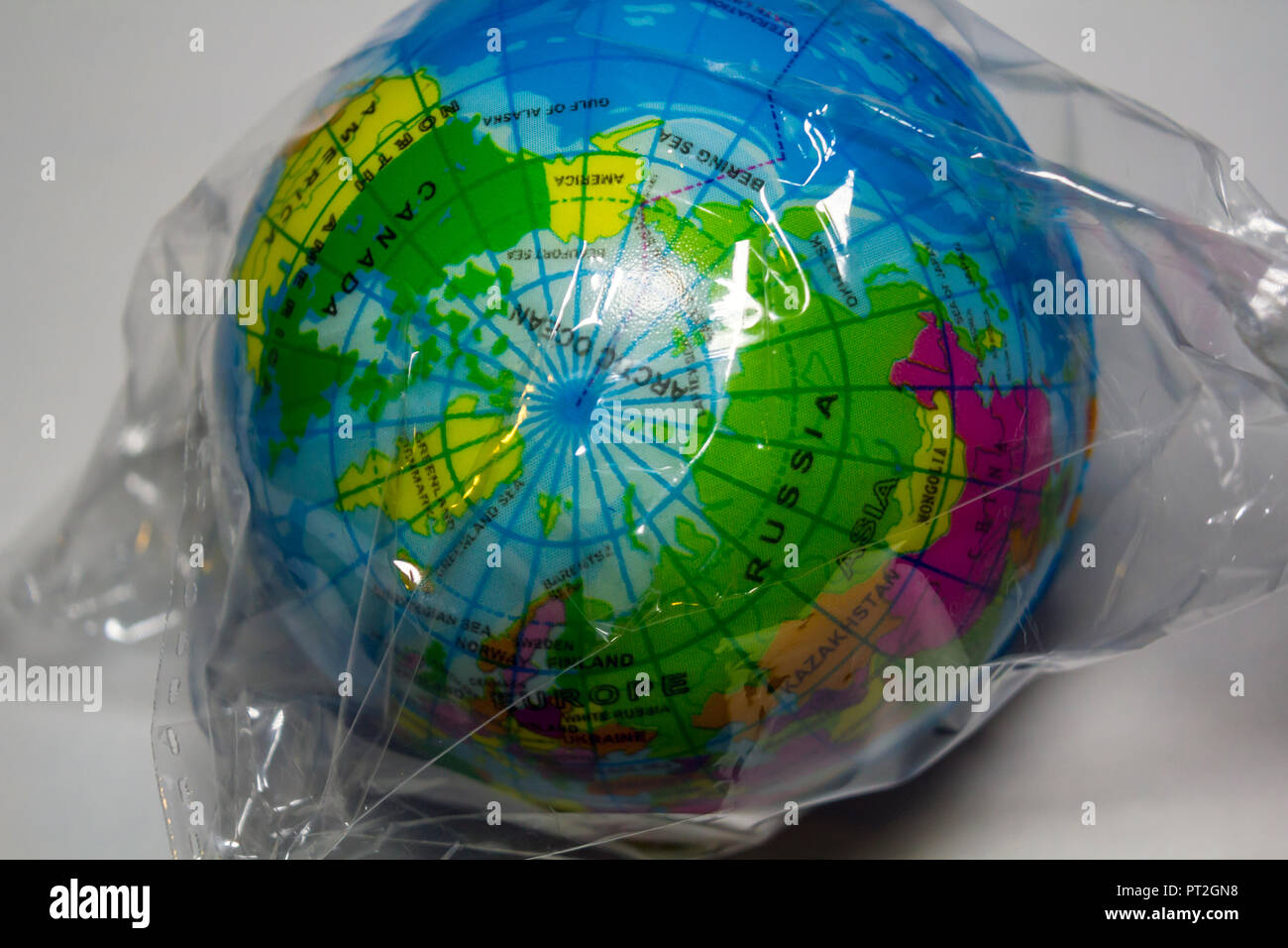 World wrapped in plastic. Plastic pollution concept Stock Photo - Alamy