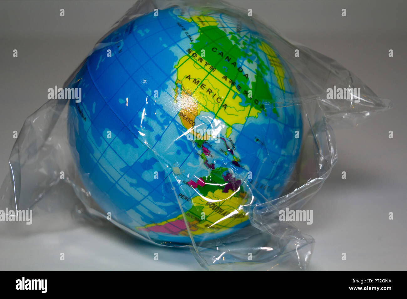 World wrapped in plastic. Plastic pollution concept Stock Photo - Alamy