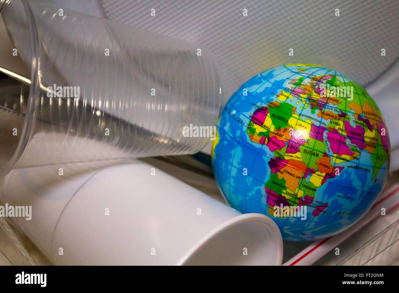 World surrounded by plastic trash Stock Photo - Alamy