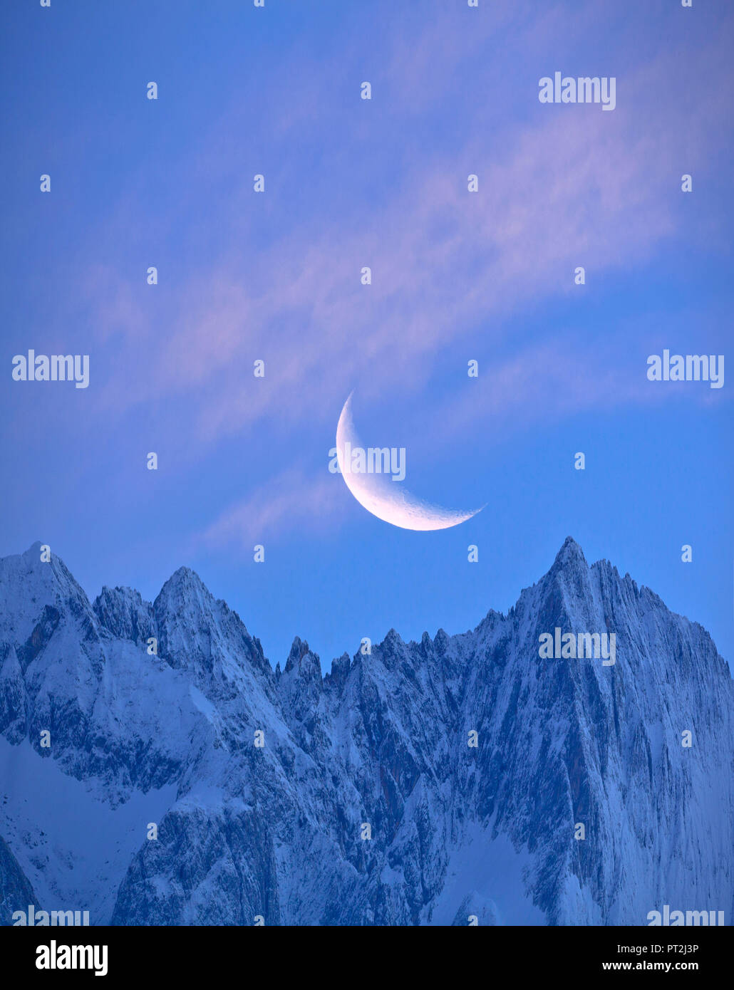Mountain landscape with crescent moon m hi-res stock photography and ...