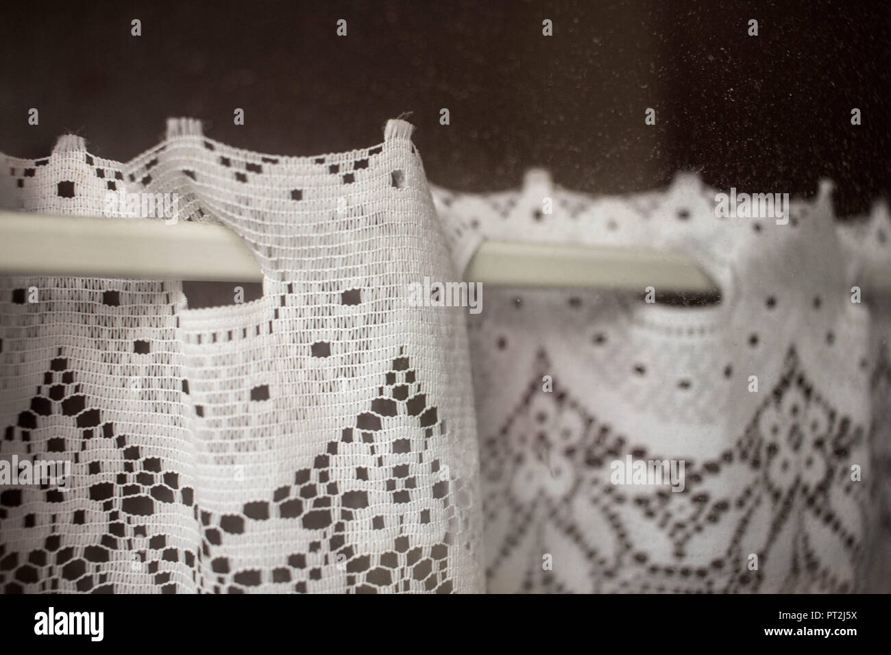 Old-fashioned curtain at the window Stock Photo - Alamy