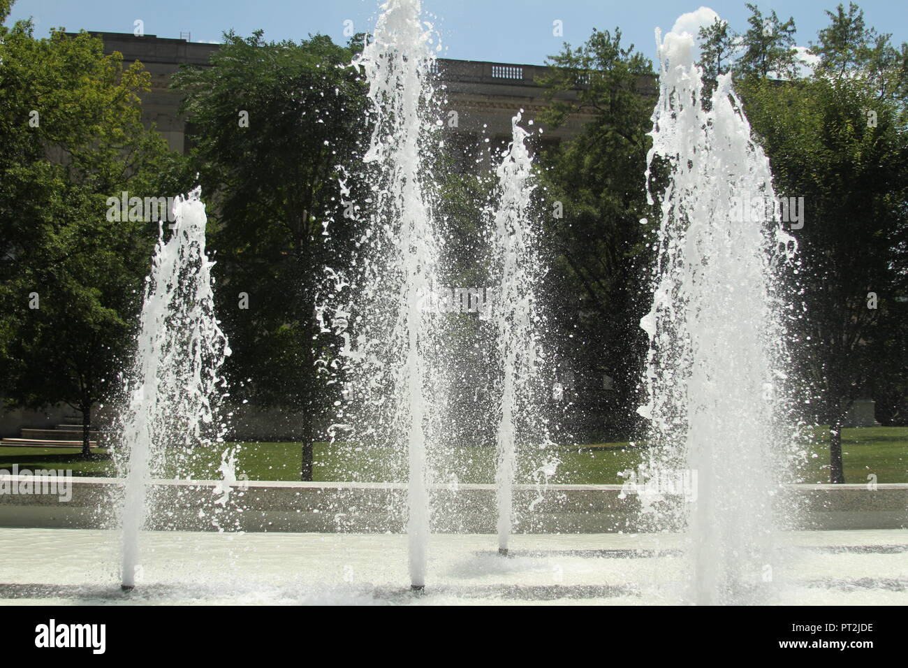 Fountains going outside of a building in Springfield Stock Photo - Alamy