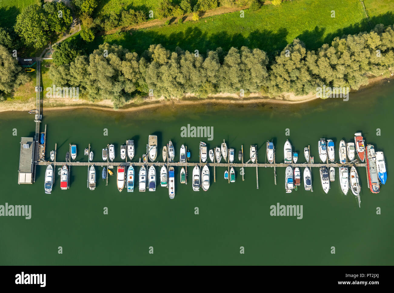 Quarry pond niederbormter with boat jetties hi-res stock photography ...