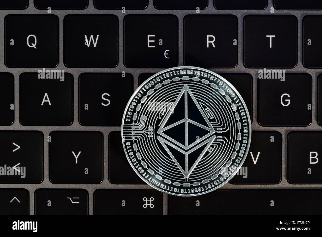 Symbol image of digital currency, silver physical coin Ethereum on ...