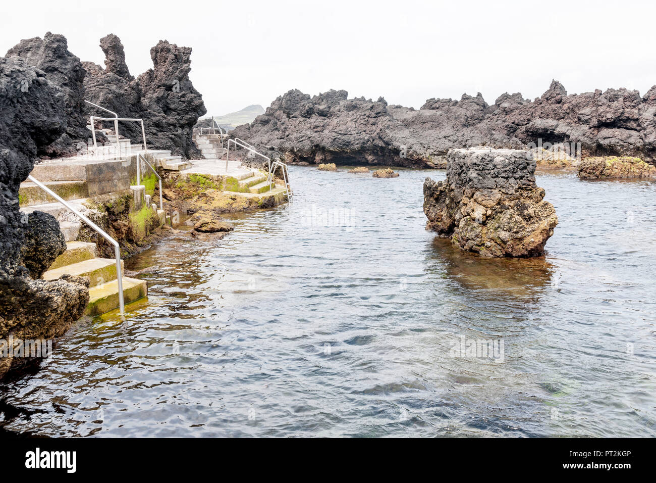 Seawater swimming pool in volcanic rock pools at Biscoitos Stock Photo ...