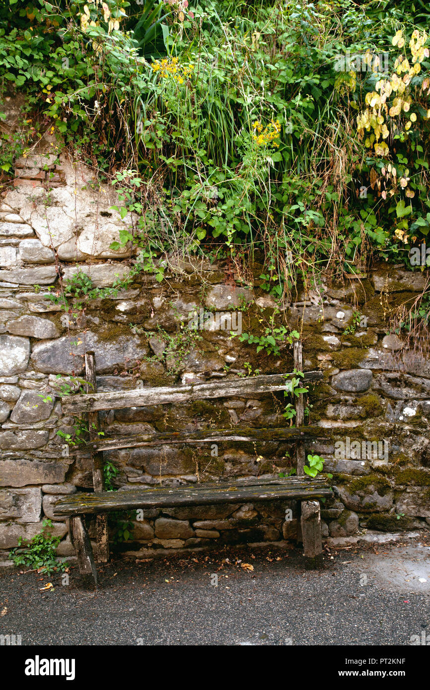 Natural stone wall, Park bench, Tuscany, Italy Stock Photo - Alamy