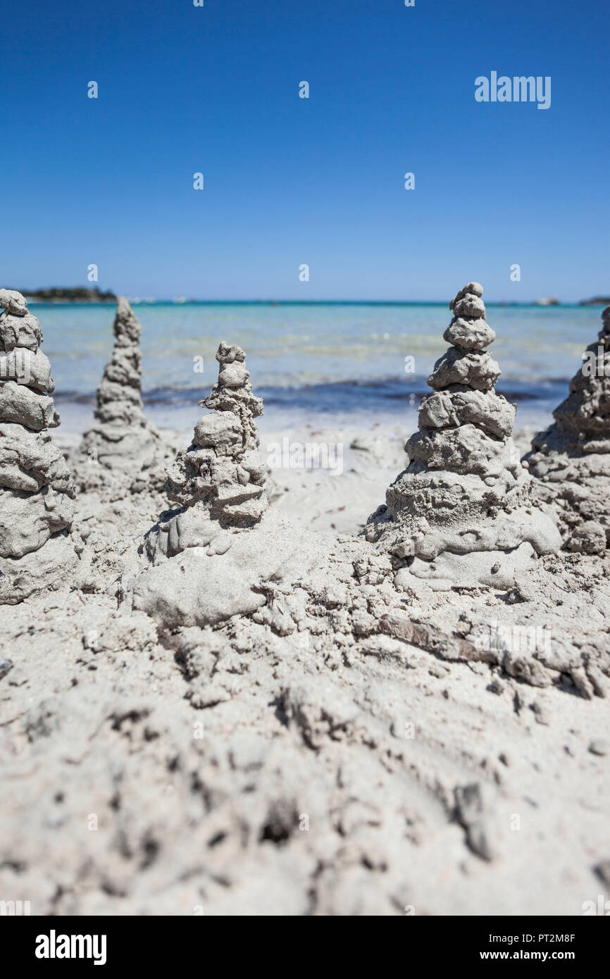 Sandcastles in beautiful bay Stock Photo - Alamy