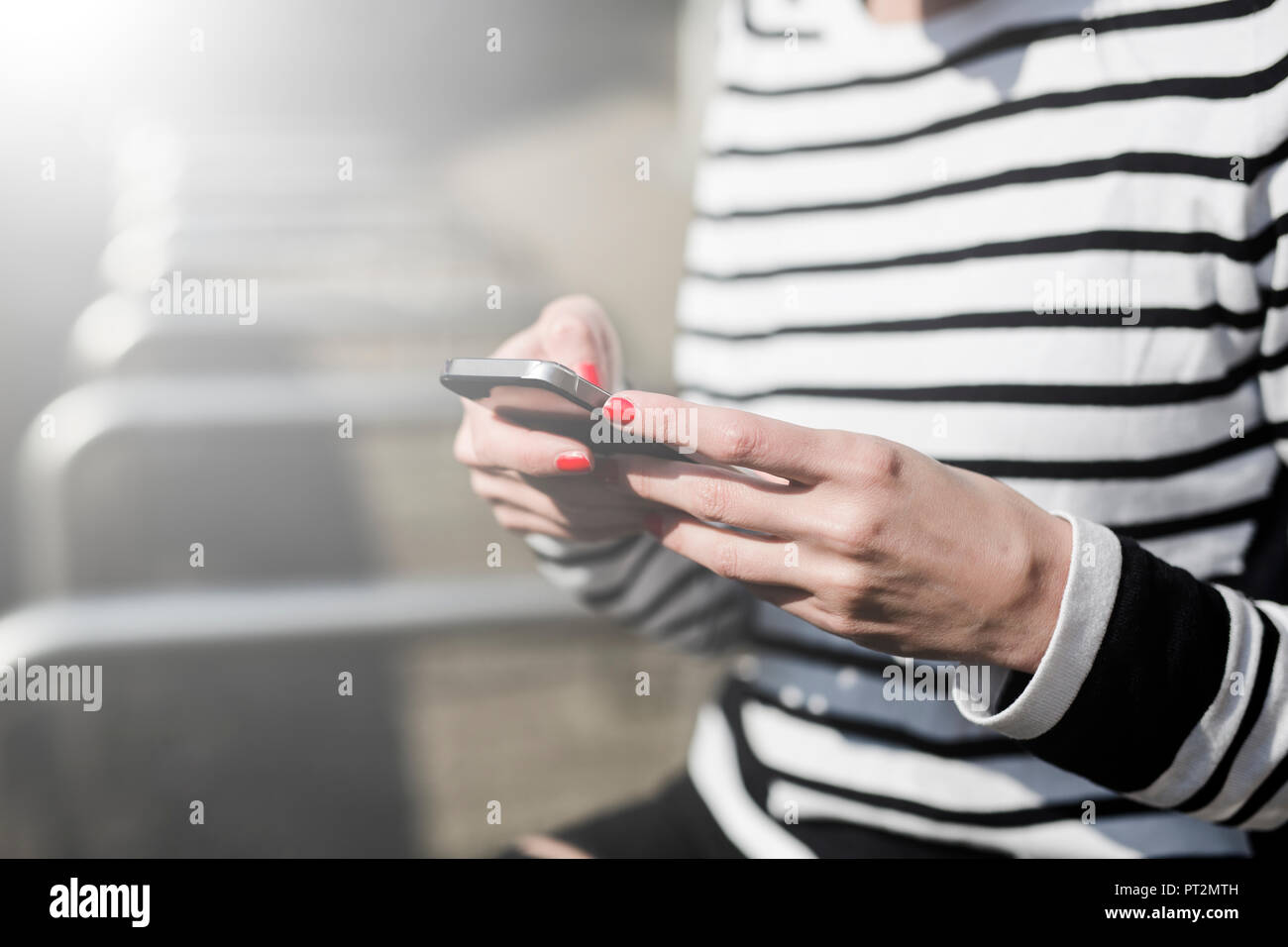 Cell hands close hi-res stock photography and images - Alamy
