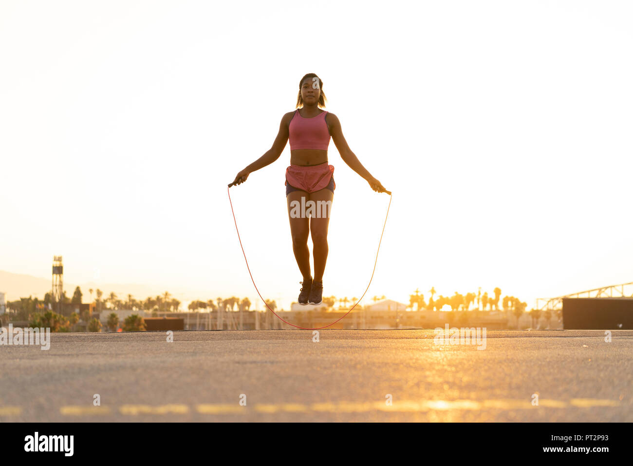 Full body young african woman jump hi-res stock photography and images ...