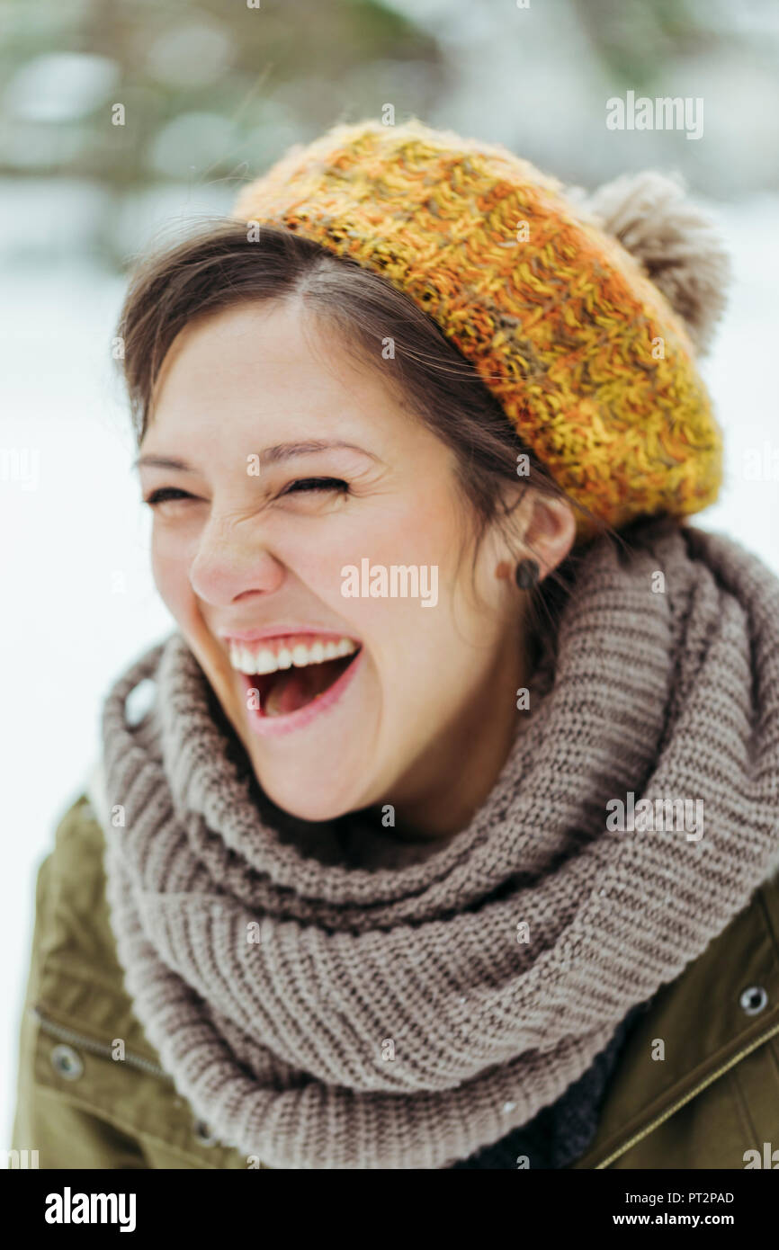 Woman laughing in snow hi-res stock photography and images - Alamy