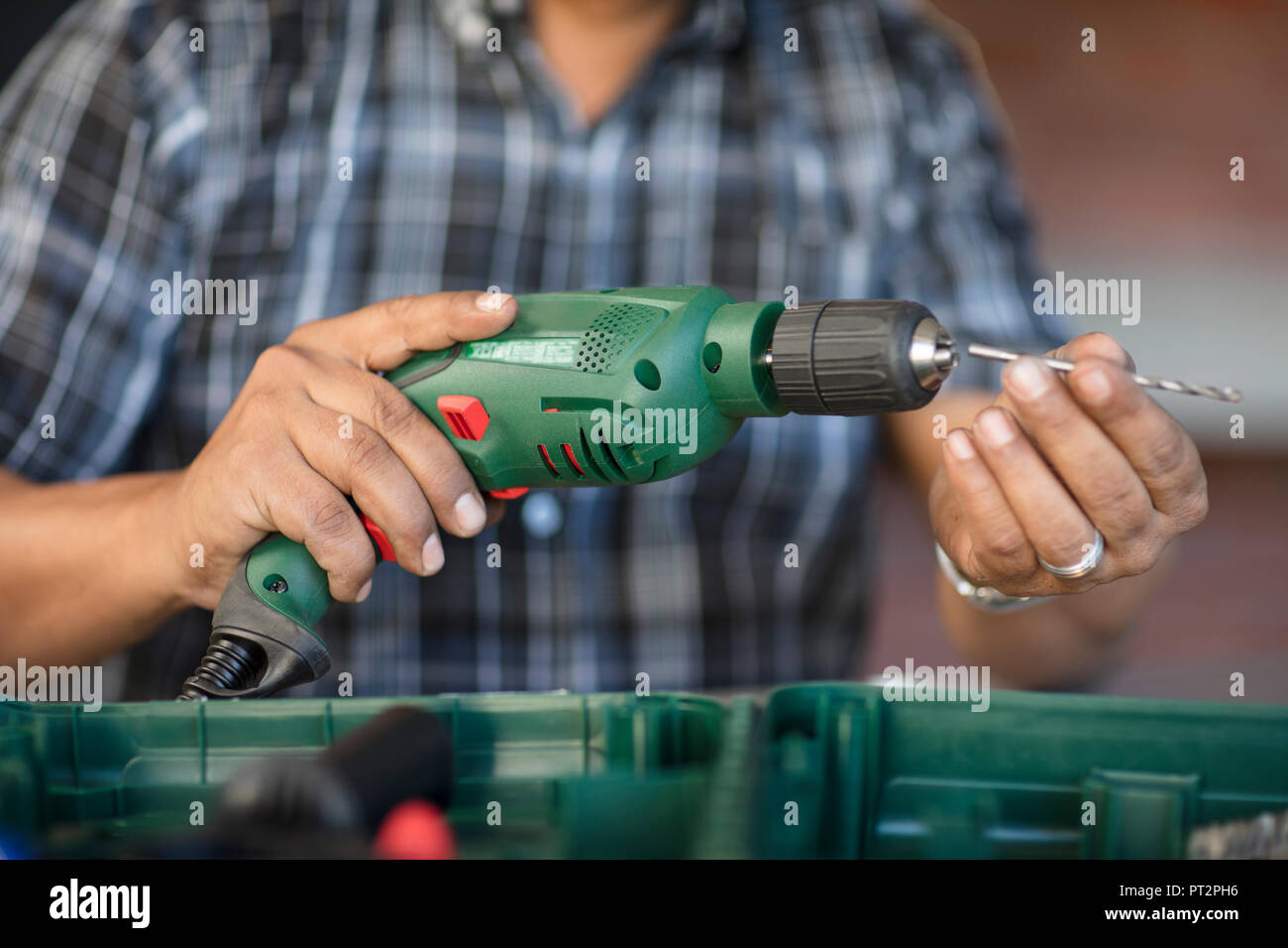Close up hands holding portable hi-res stock photography and images - Alamy