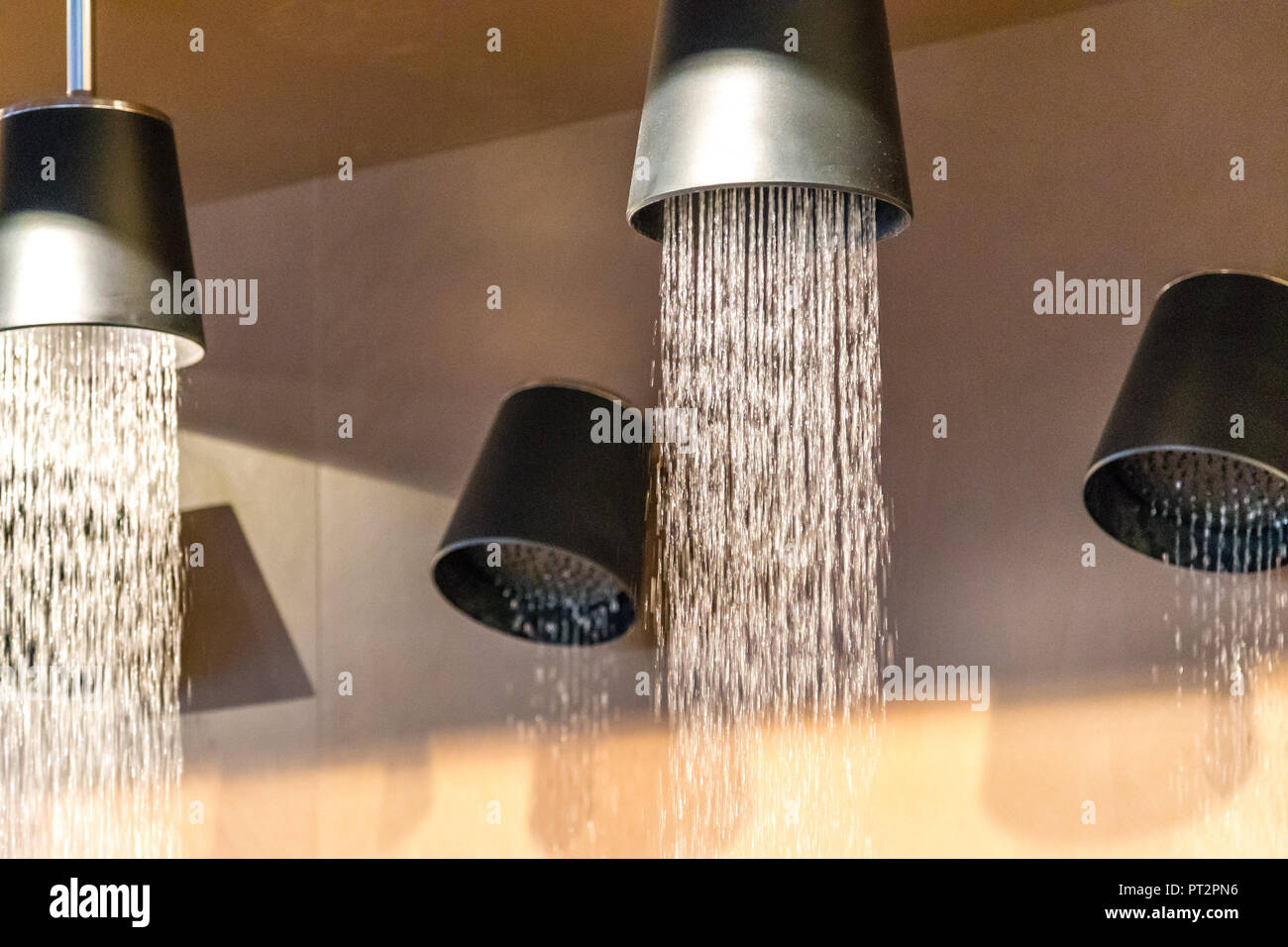 water falling from black shower heads Stock Photo - Alamy