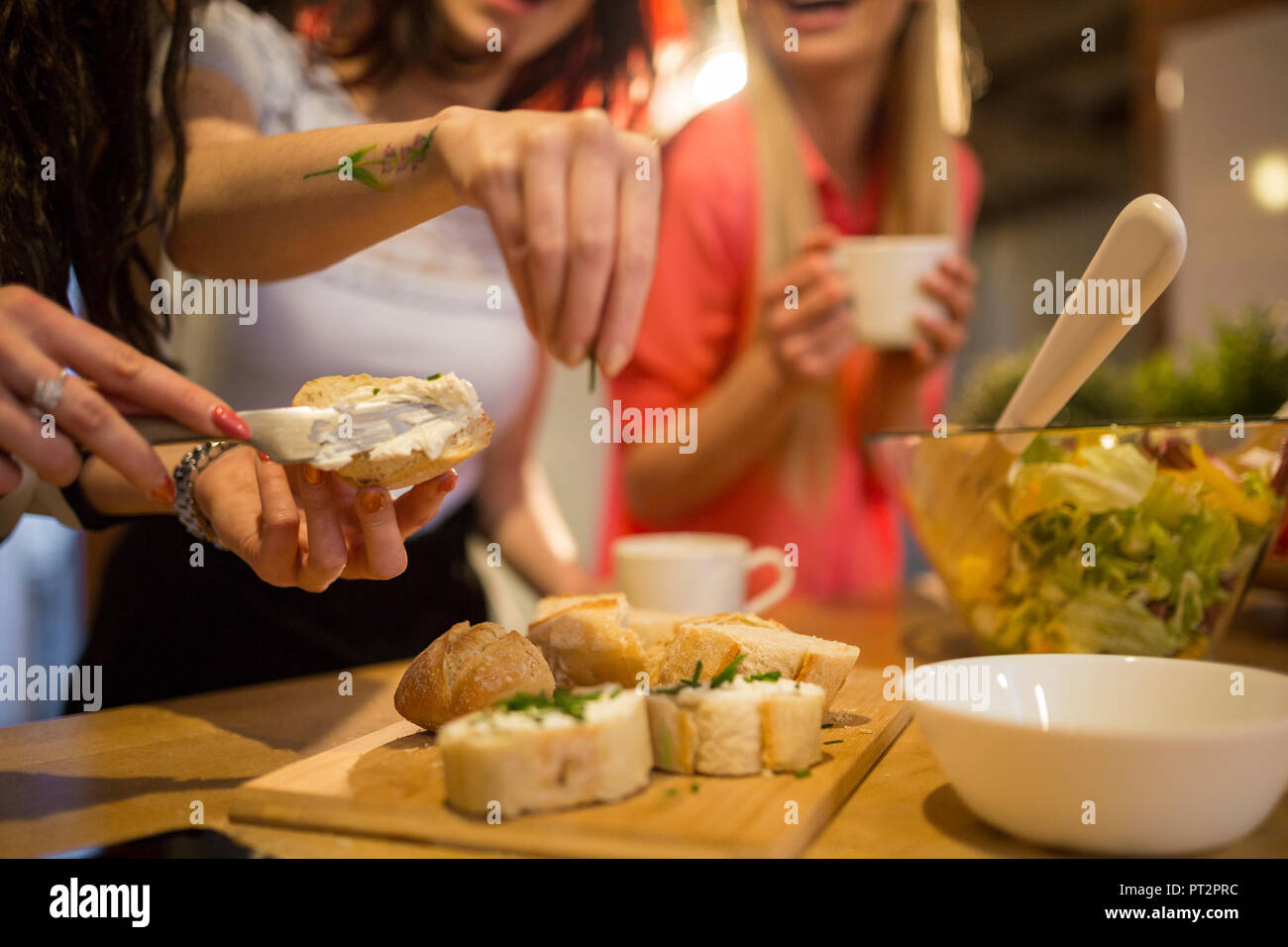 Preparing supper hi-res stock photography and images - Alamy