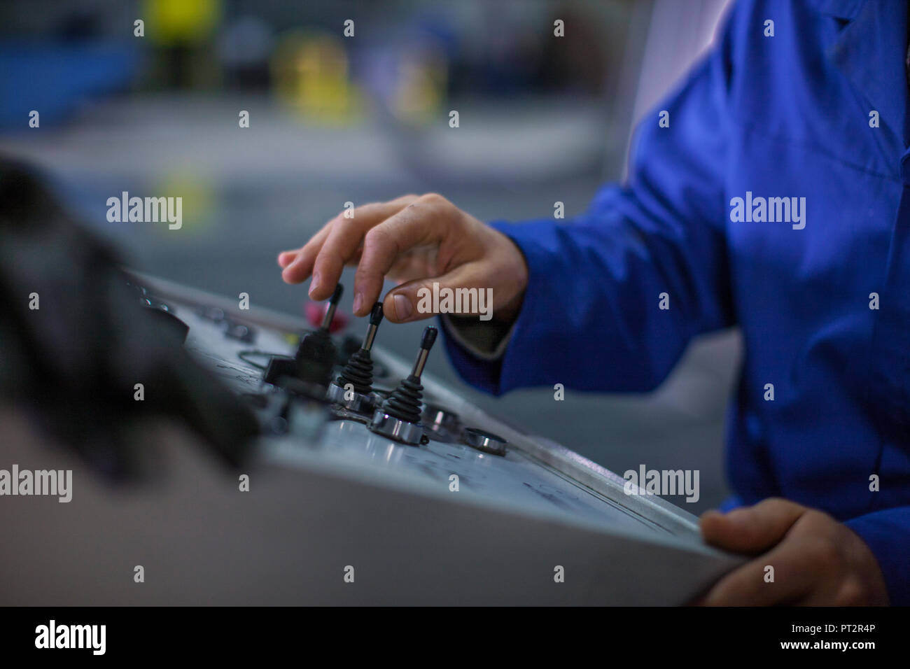 Hand operating hi-res stock photography and images - Alamy