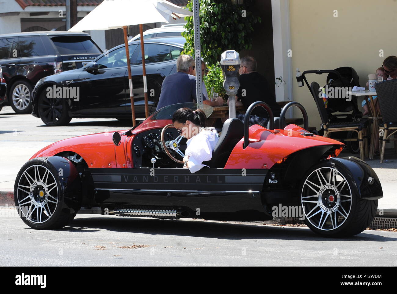 Kyle Richards arrives to meet Lisa Rinna in a three wheel Vanderhall ...