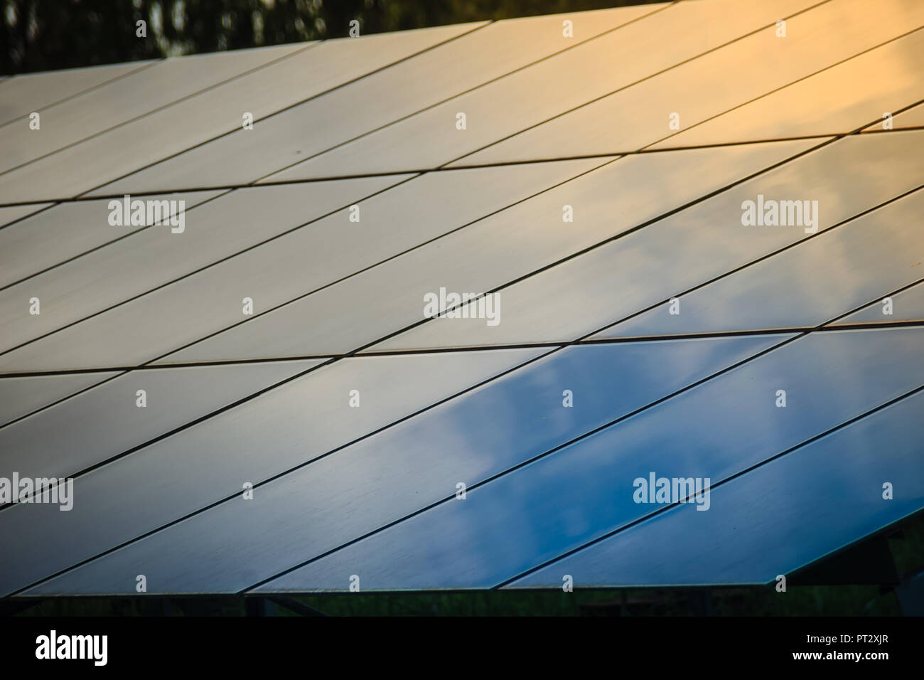 Solar cells (photovoltaic panel) with the reflection of sunlight, blue ...