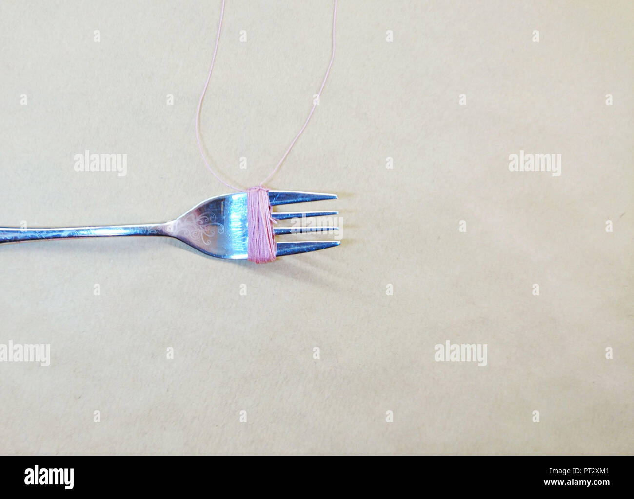 DIY, tassel, yarn, fork Stock Photo - Alamy