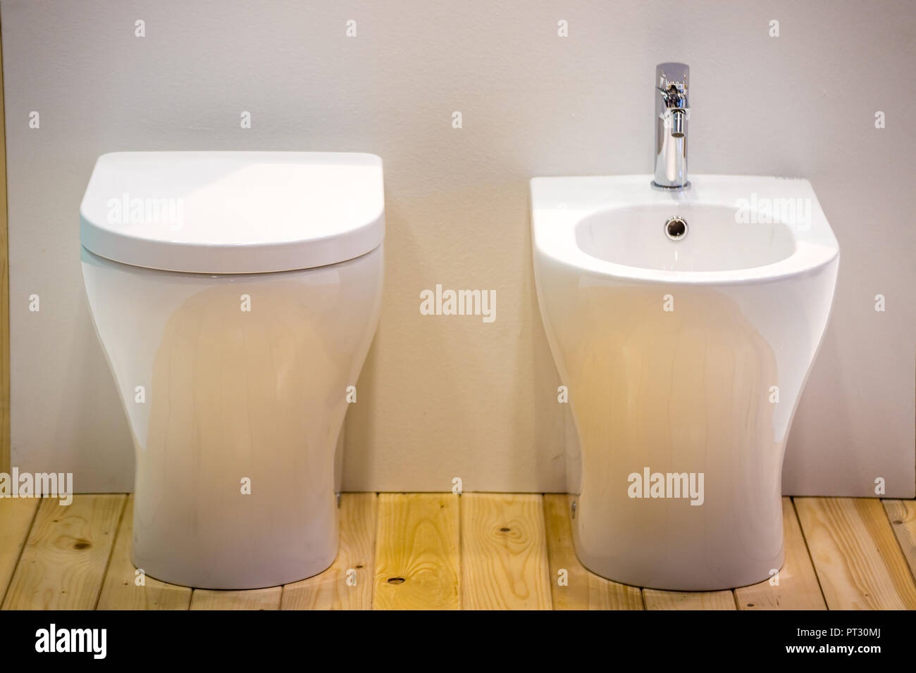 white toilet bowl and bidet Stock Photo - Alamy