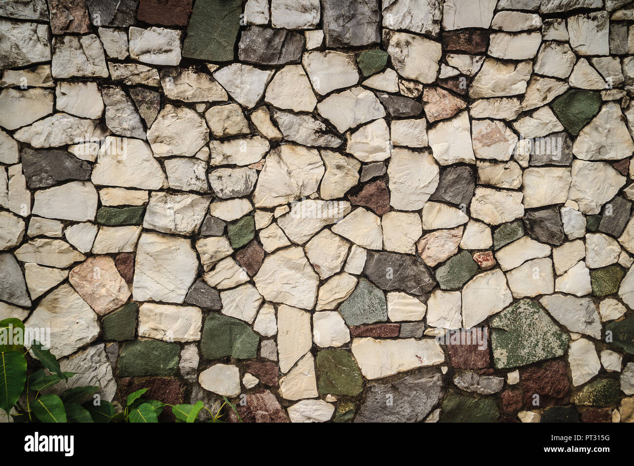 Vintage nature cobblestone wall in disorganized arrangement pattern ...