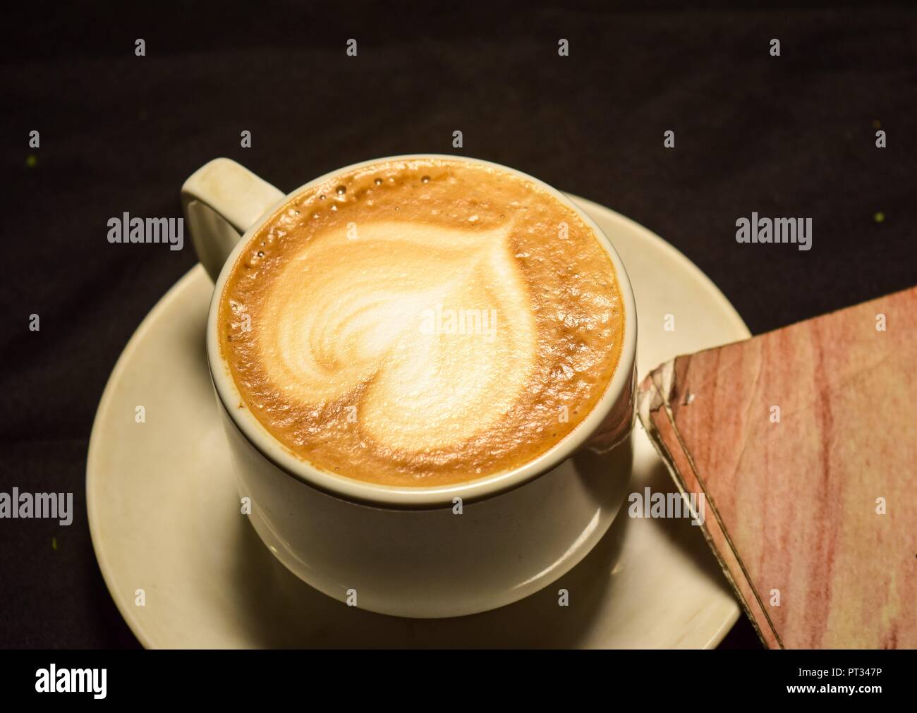 Love coffee, a cup of latte art with heart pattern in a white cup Stock Photo - Alamy