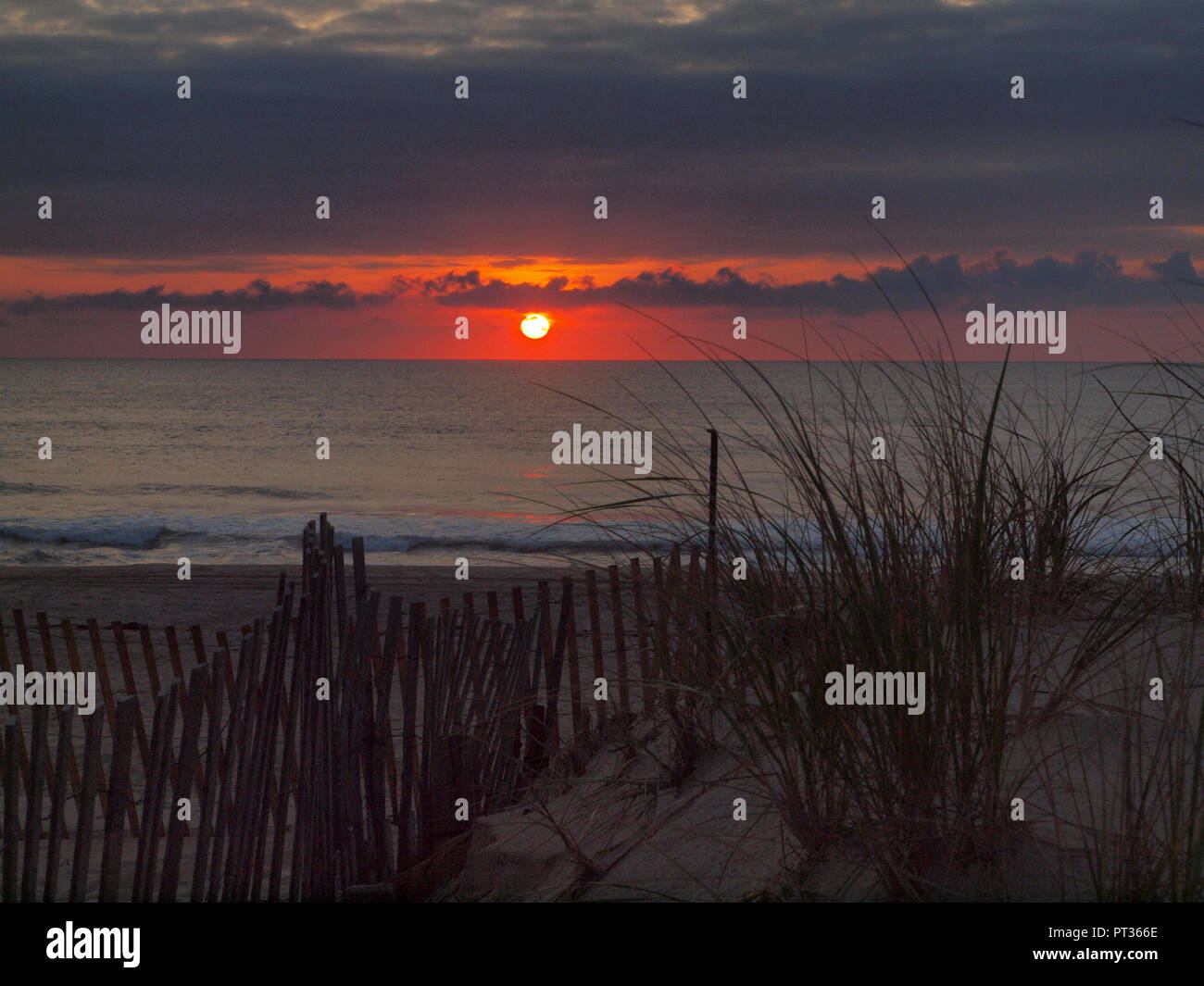 Beautiful sunrise over the New Jersey shore at Ocean Beach, NJ Stock ...